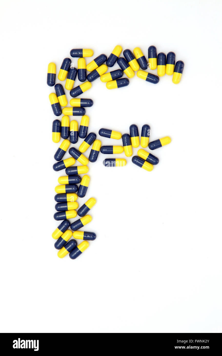 The letter F alphabet made of medical capsules Stock Photo - Alamy