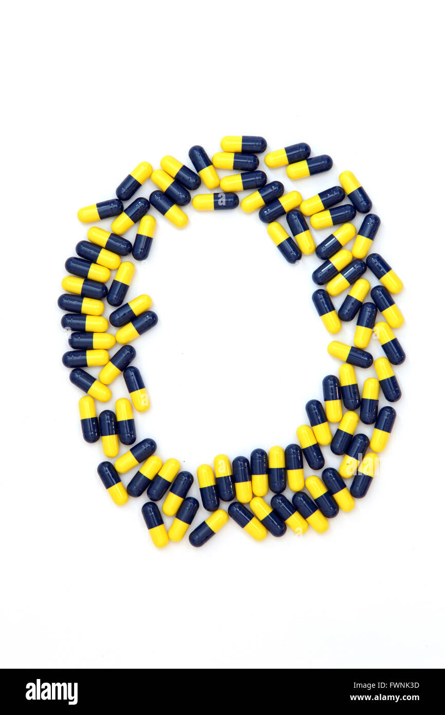 The letter O alphabet made of medical capsules Stock Photo - Alamy