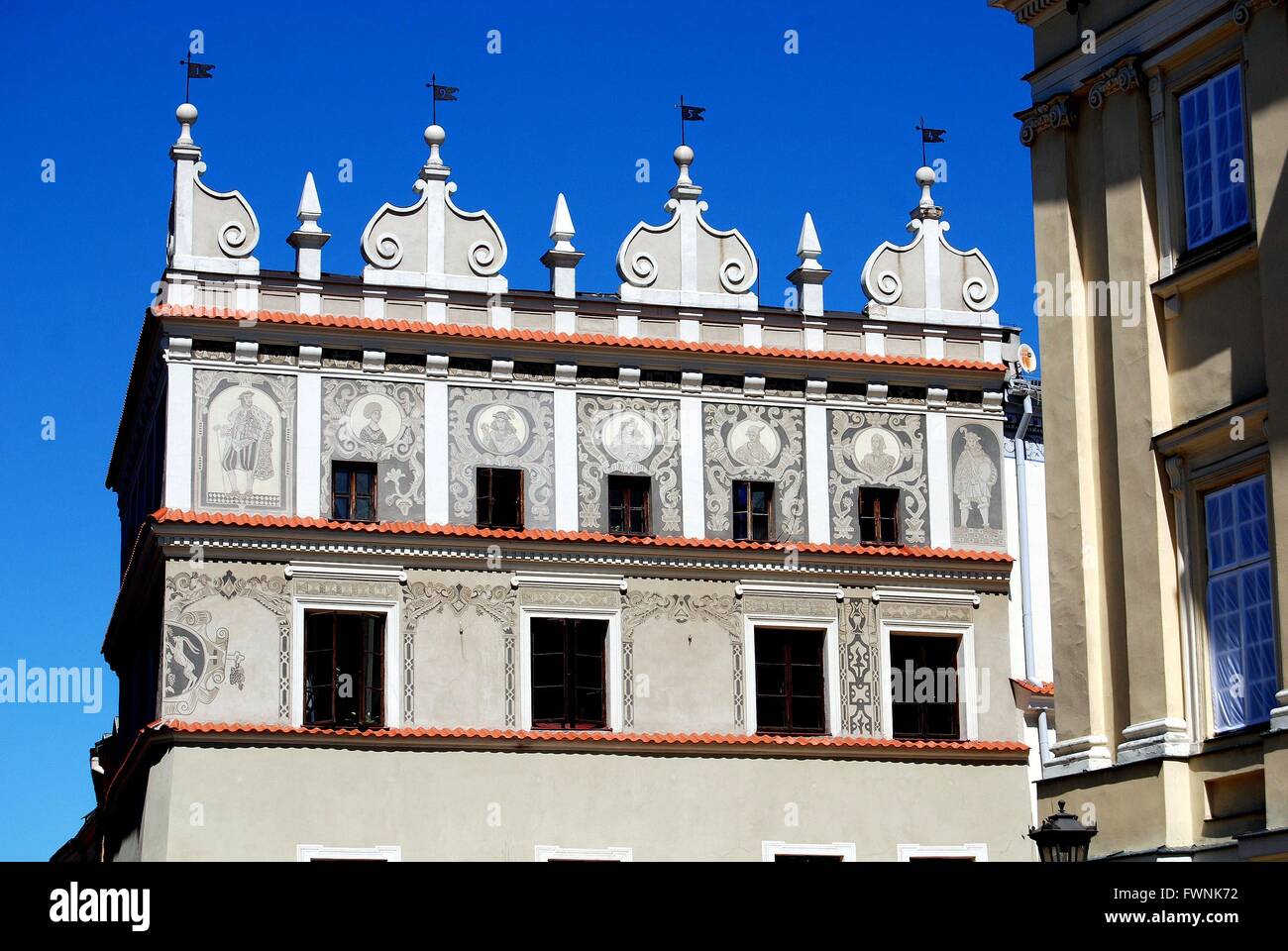 Lublin, Poland: Baroque building with painted frescoes and ornamental ...