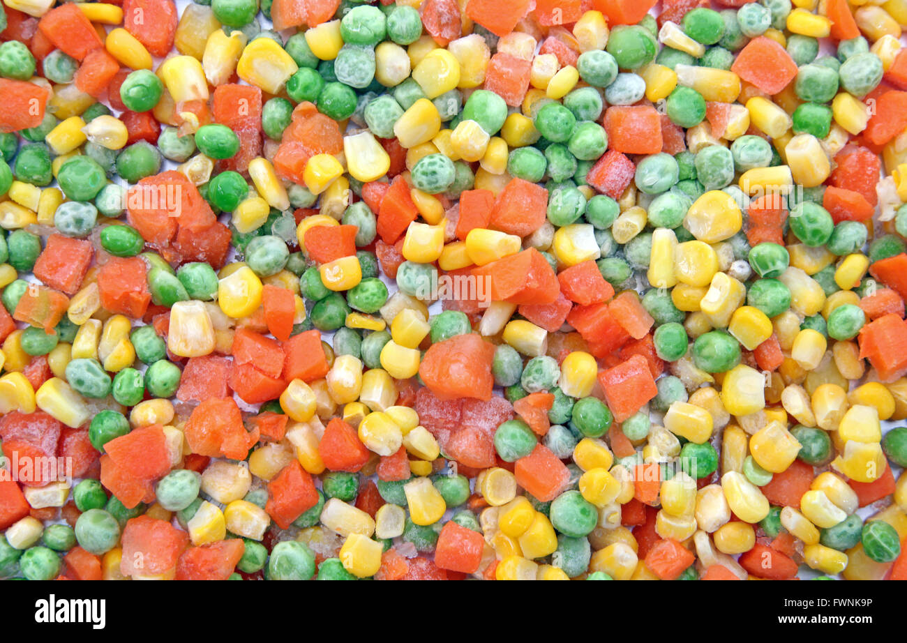 chilling of carrot pea and corn using as background Stock Photo - Alamy