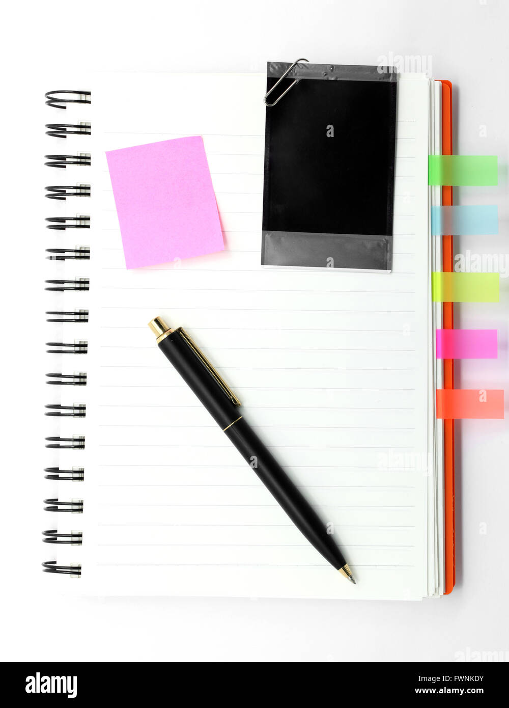 Blank Ring binding book with pen and photo frame Stock Photo - Alamy