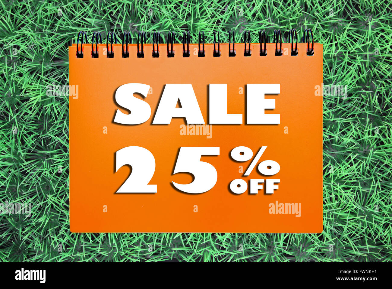 25% Sale sign on grass background Stock Photo - Alamy