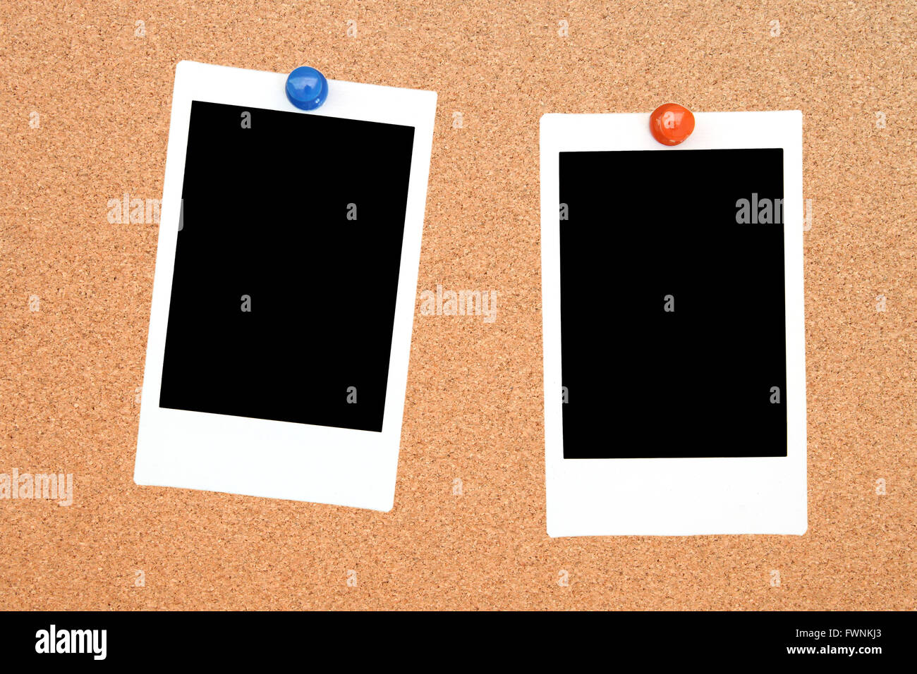 two blank instant photo frame on notice cork board Stock Photo - Alamy