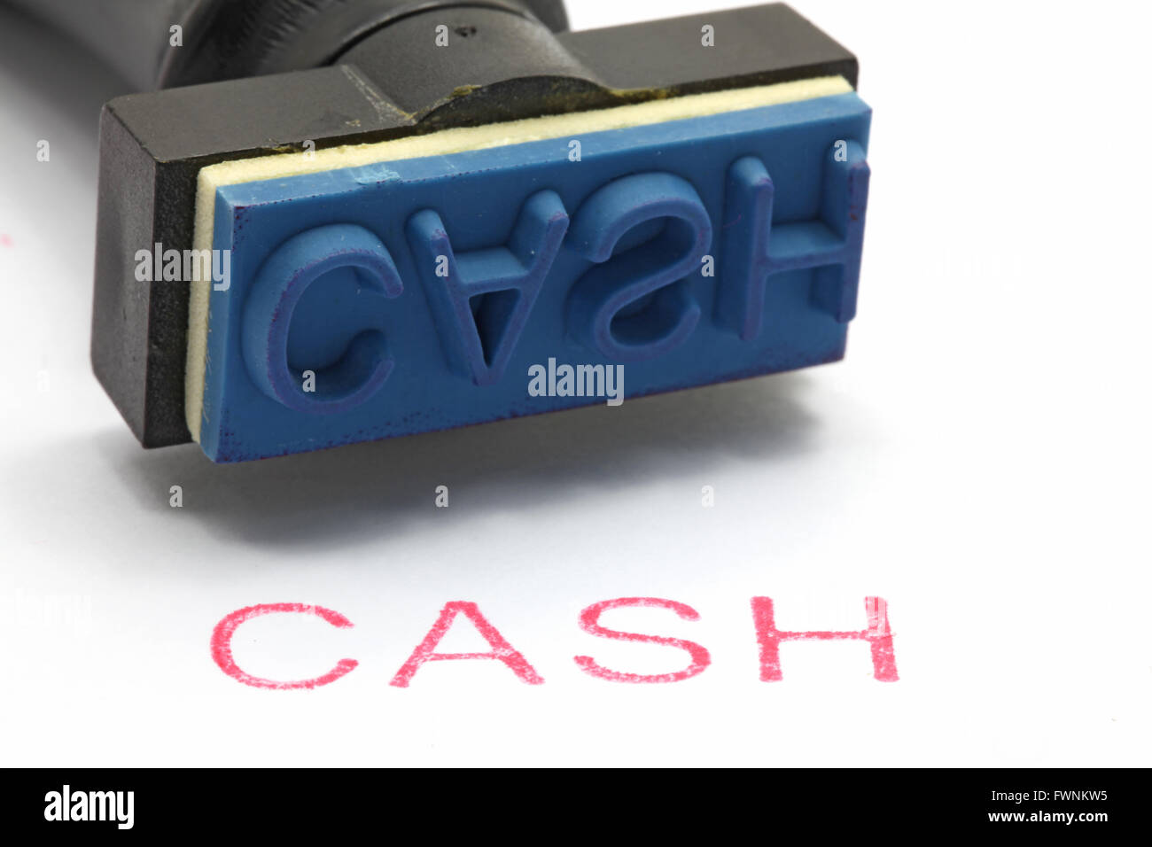 closeup of cash letter on rubber stamp isolated on white background ...