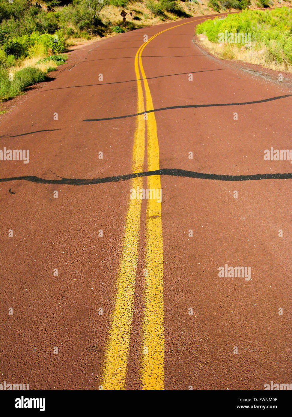 typical yellow strip on the road America Stock Photo - Alamy