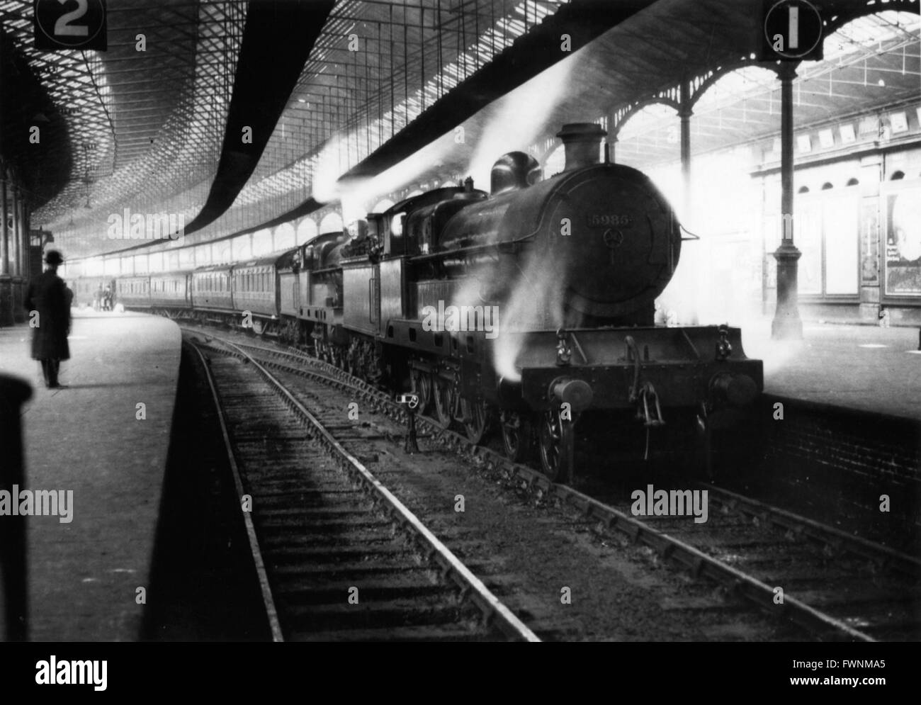 This up express has arrived at Euston behind two un-rebuilt Claughtons ...