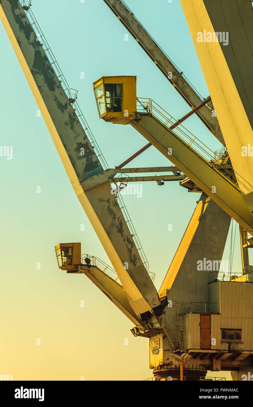 Business and commerce. Heavy load dockside cranes in port, cargo ...