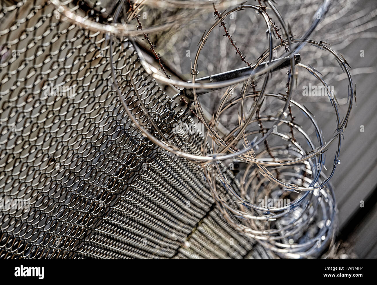 Chain link fence razor wire hi-res stock photography and images - Alamy