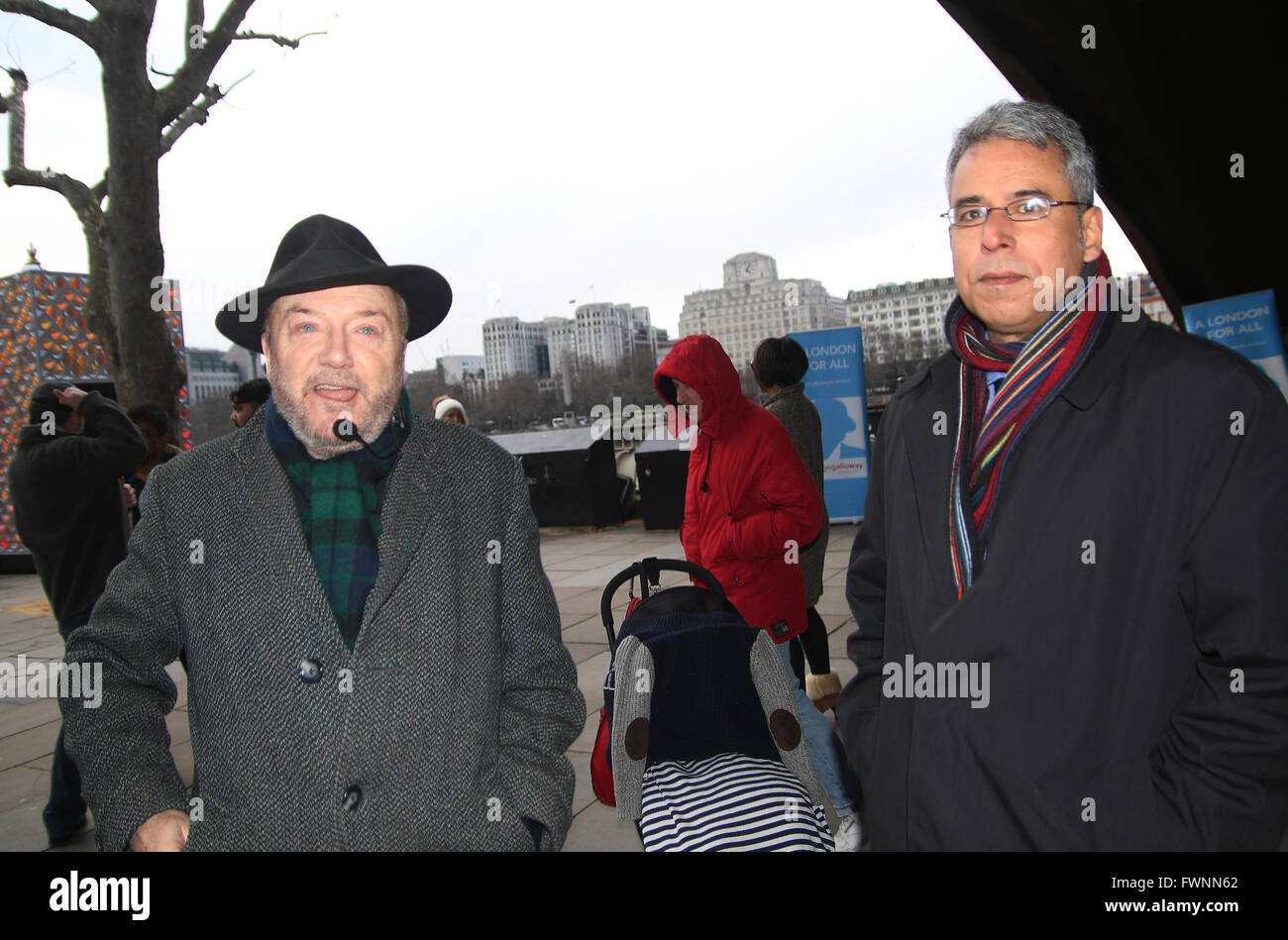 George Galloway, joined by his wife and daughter, talks to passers-by ...