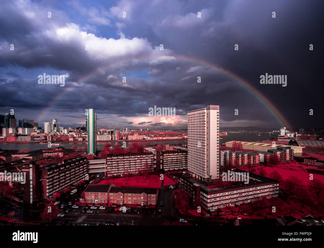 London, UK. 7th April, 2016. UK Weather: Colourful rainbow breaks ...
