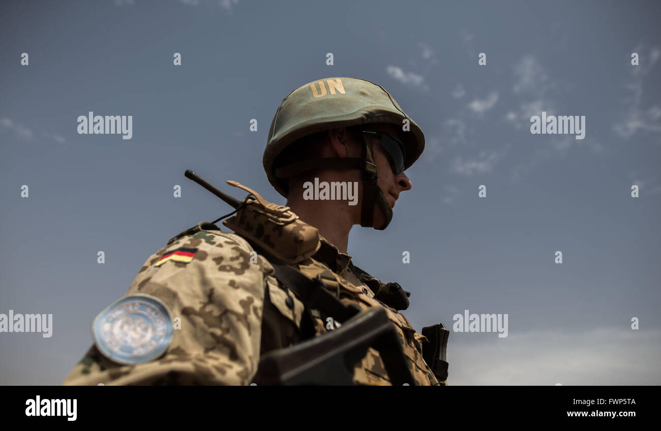 Gao, Mali. 05th Apr, 2016. A member of the German armed forces wears a ...