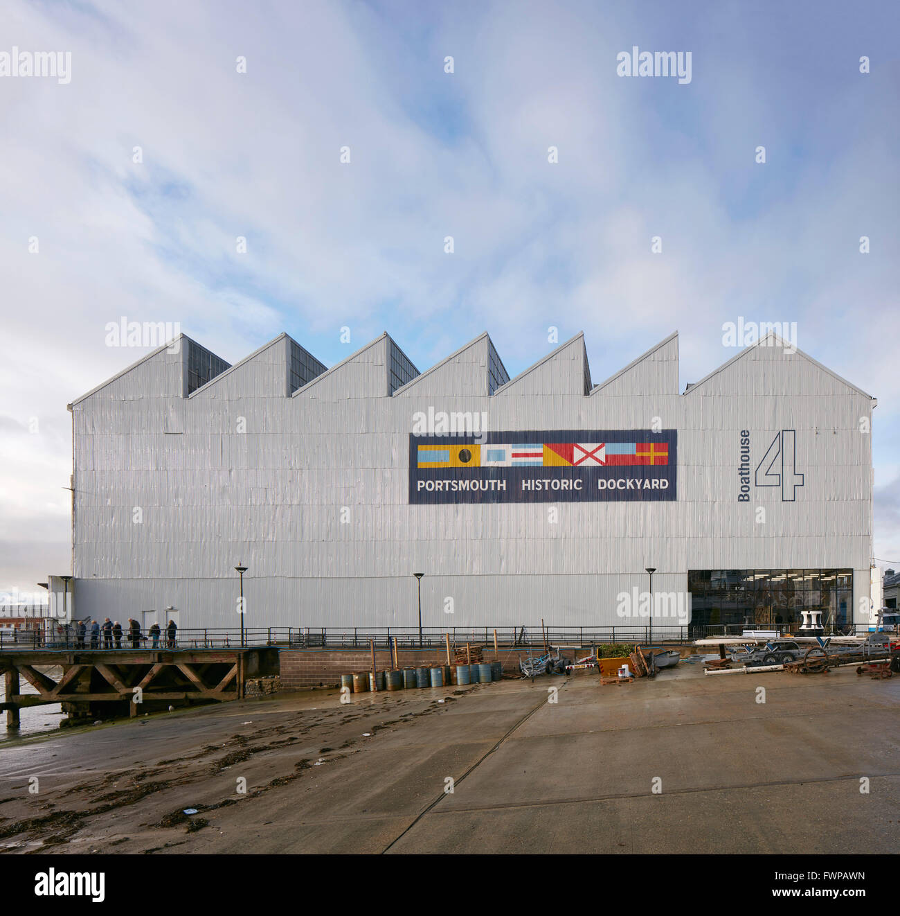 Front elevation of saw-tooth roof and exterior facade with slipway ...