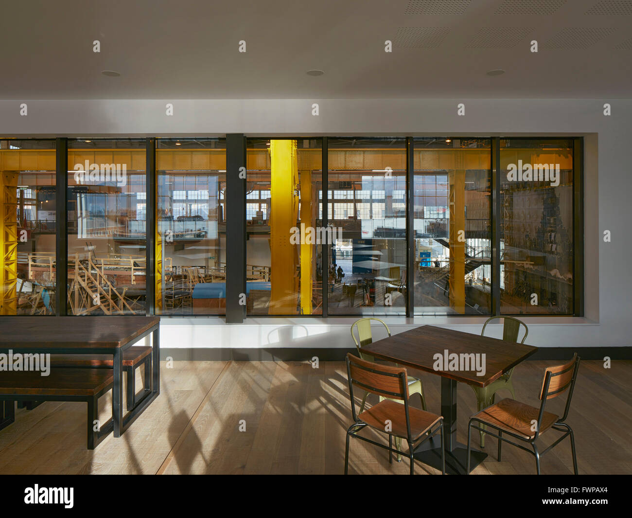 Mezzanine restaurant with view towards industrial hall. Boathouse 4 ...