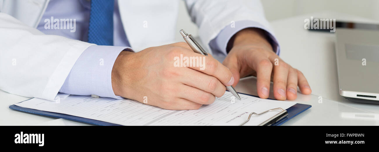 Close up of doctor's hands writing prescription. Healthcare and medical ...