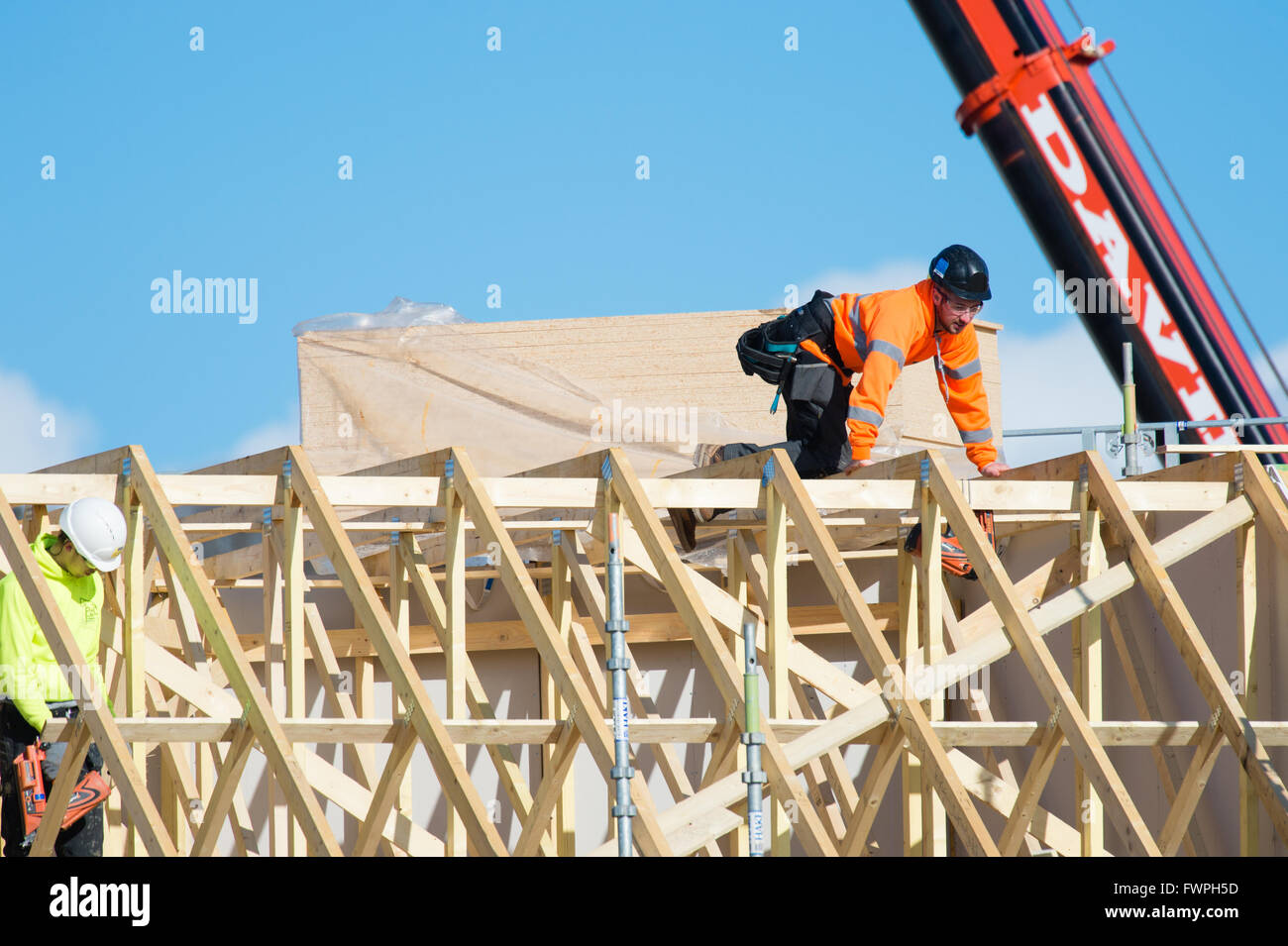 Carpenter construction roof truss hi-res stock photography and images ...