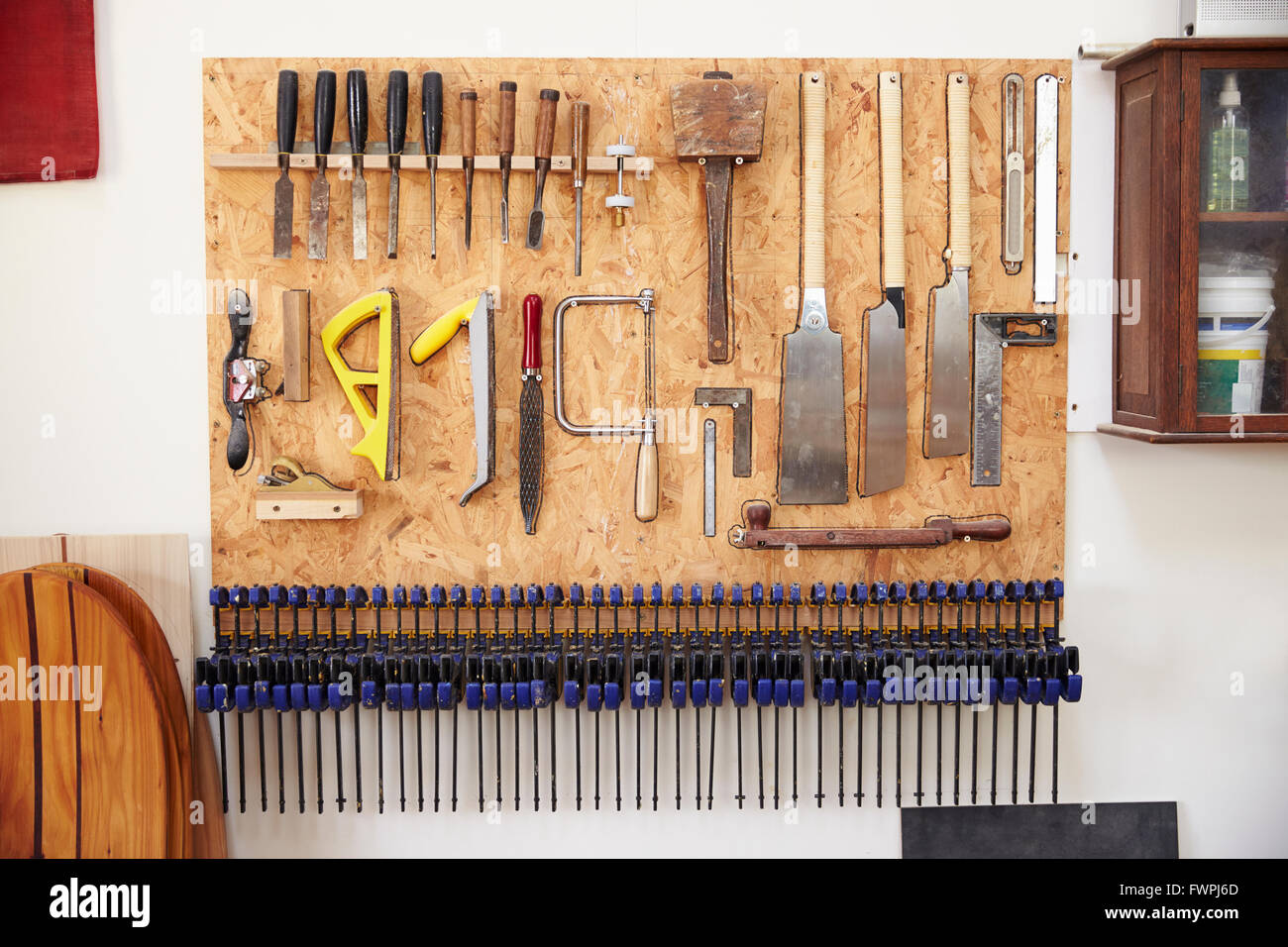 Tools Hanging Up In Bespoke Surfboard Workshop Stock Photo - Alamy