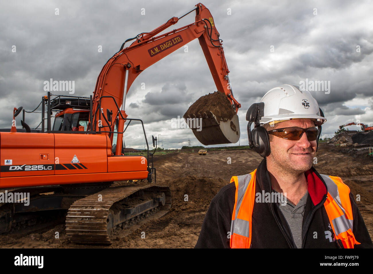 Construction worker on site during Borders Railway Construction Stock ...