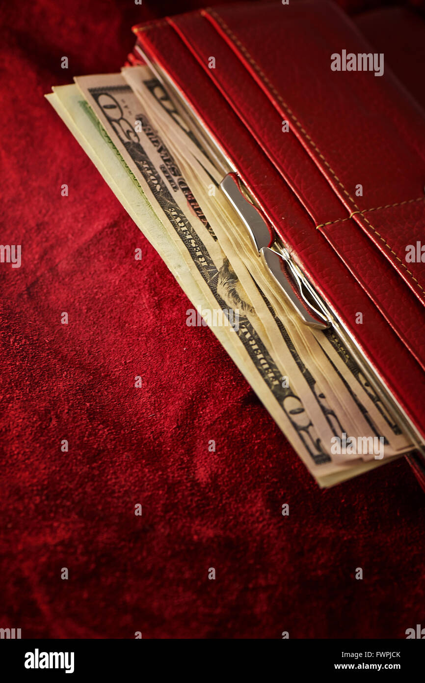Money in female red leather purse isolated on white background Stock ...