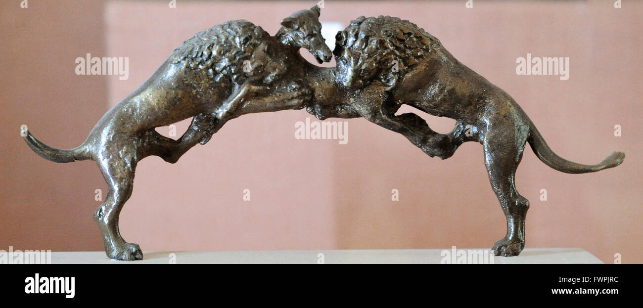 Greek art. Handle of wash-basin: lions tearing doe. Greece. Ca. 480 BC ...