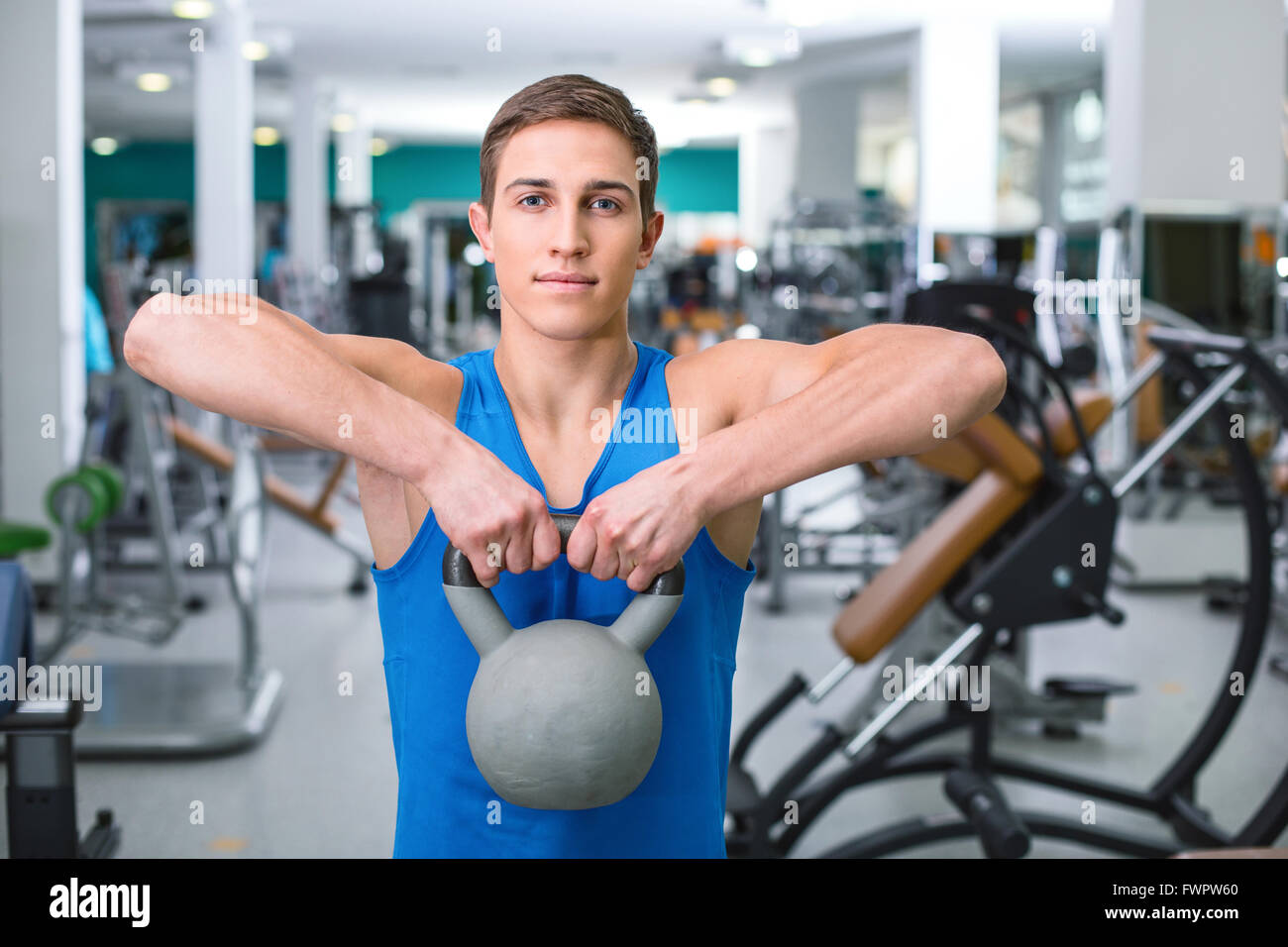 Fitness boy in sport club Stock Photo - Alamy
