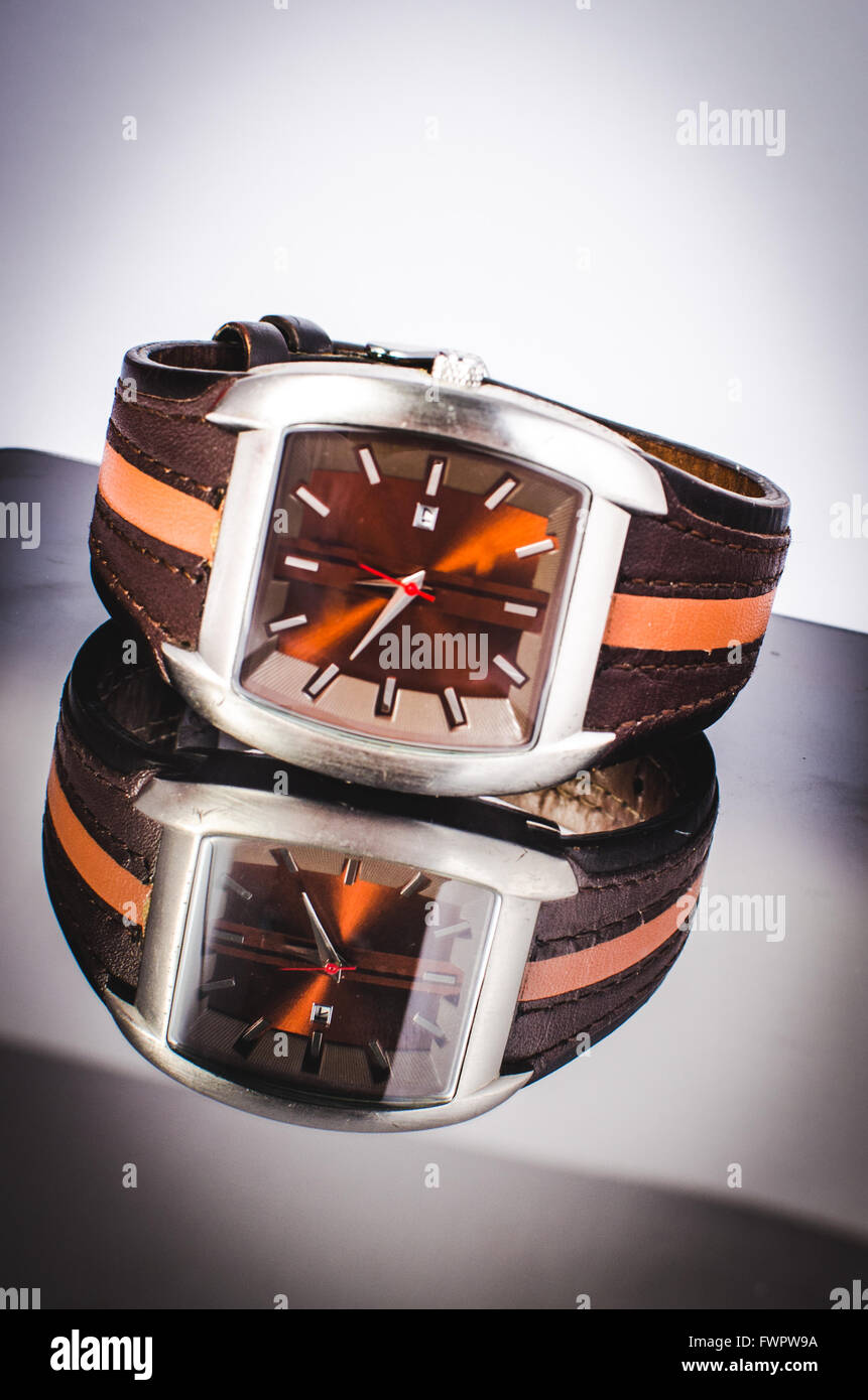 wrist watch on a reflective surface Stock Photo - Alamy