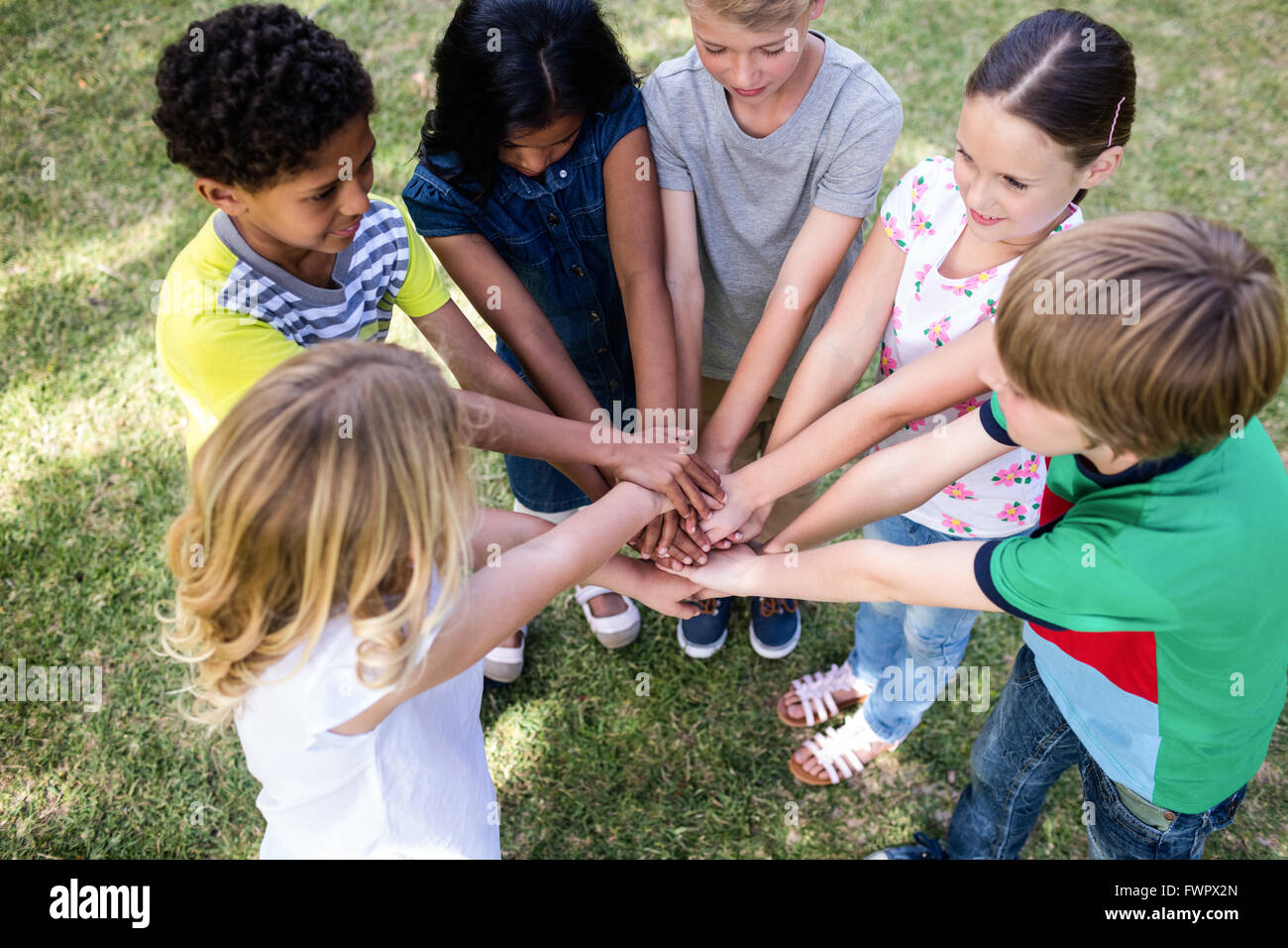 Children hands together hi-res stock photography and images - Alamy