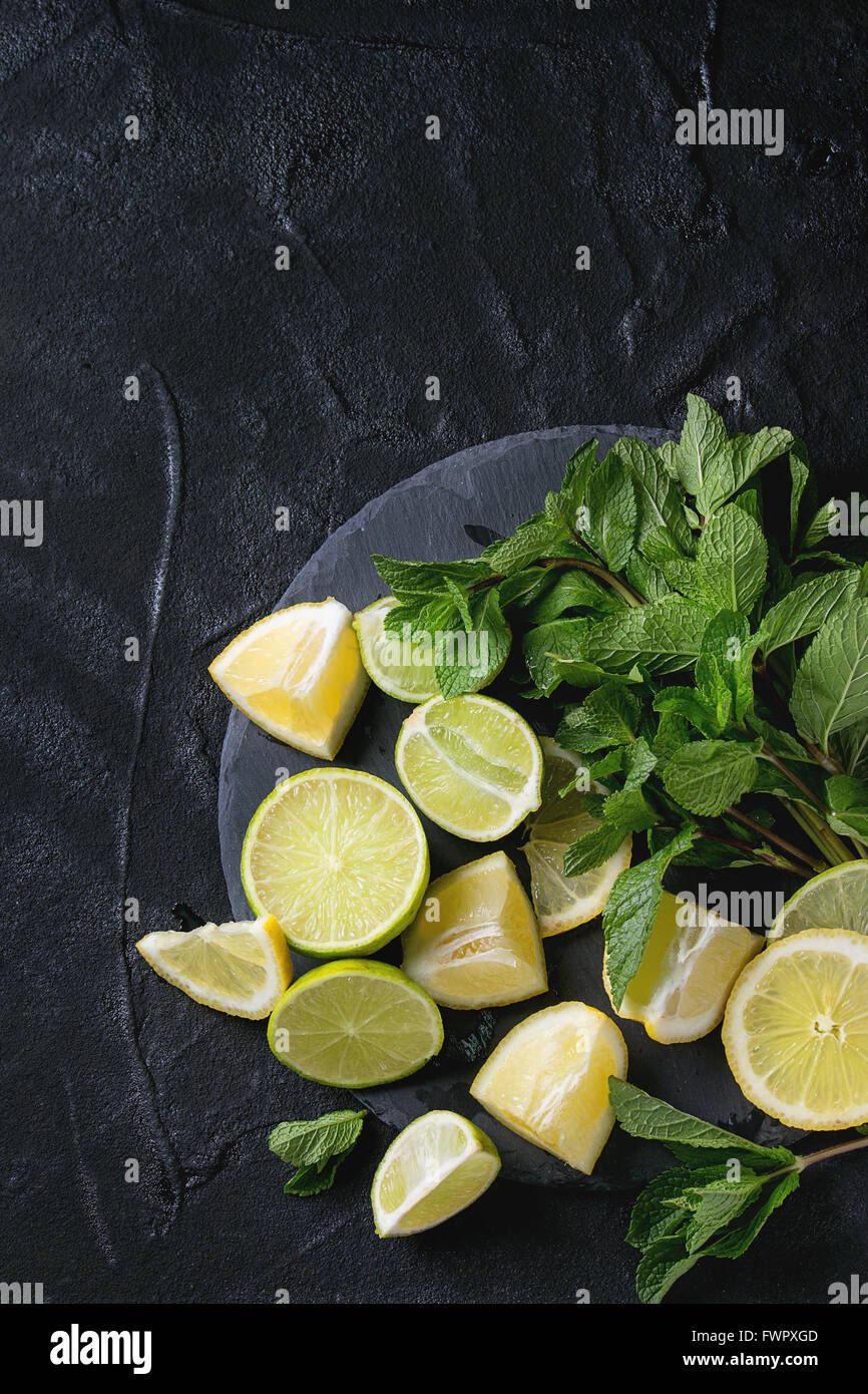 Lime and lemons with mint Stock Photo - Alamy