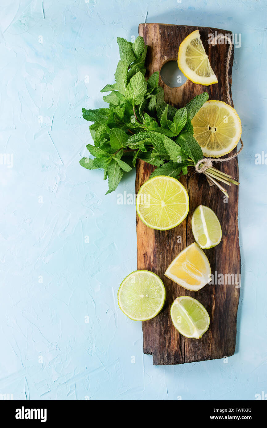 Lime and lemons with mint Stock Photo - Alamy