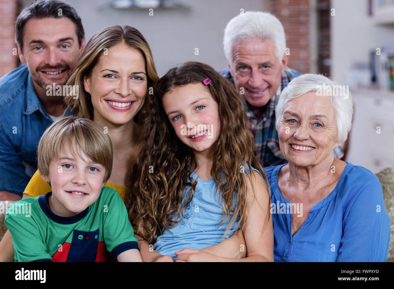 Portrait of multi-generation family at home Stock Photo - Alamy