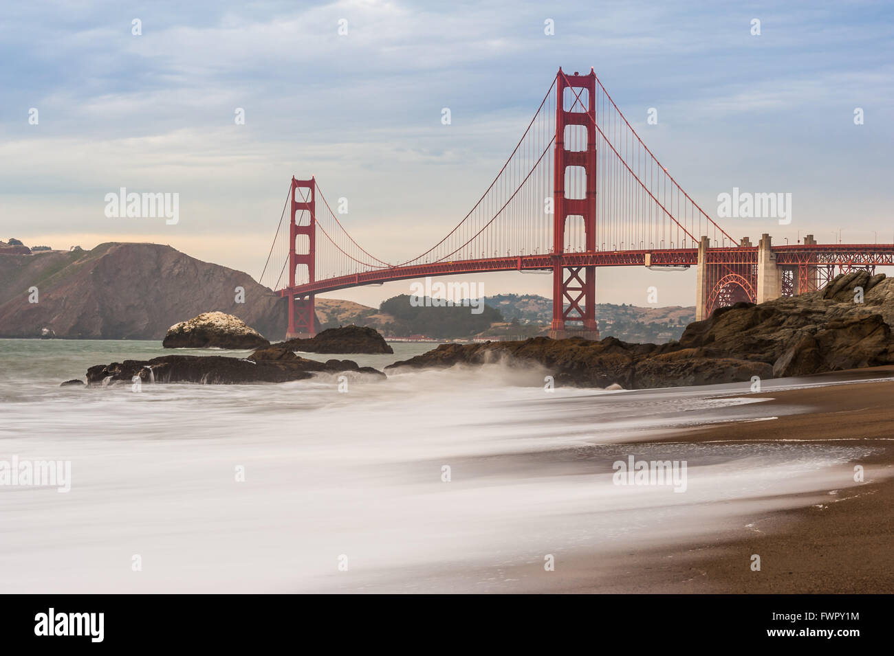 Waves crashing onto the beach at Golden Gate Bridge Stock Photo - Alamy