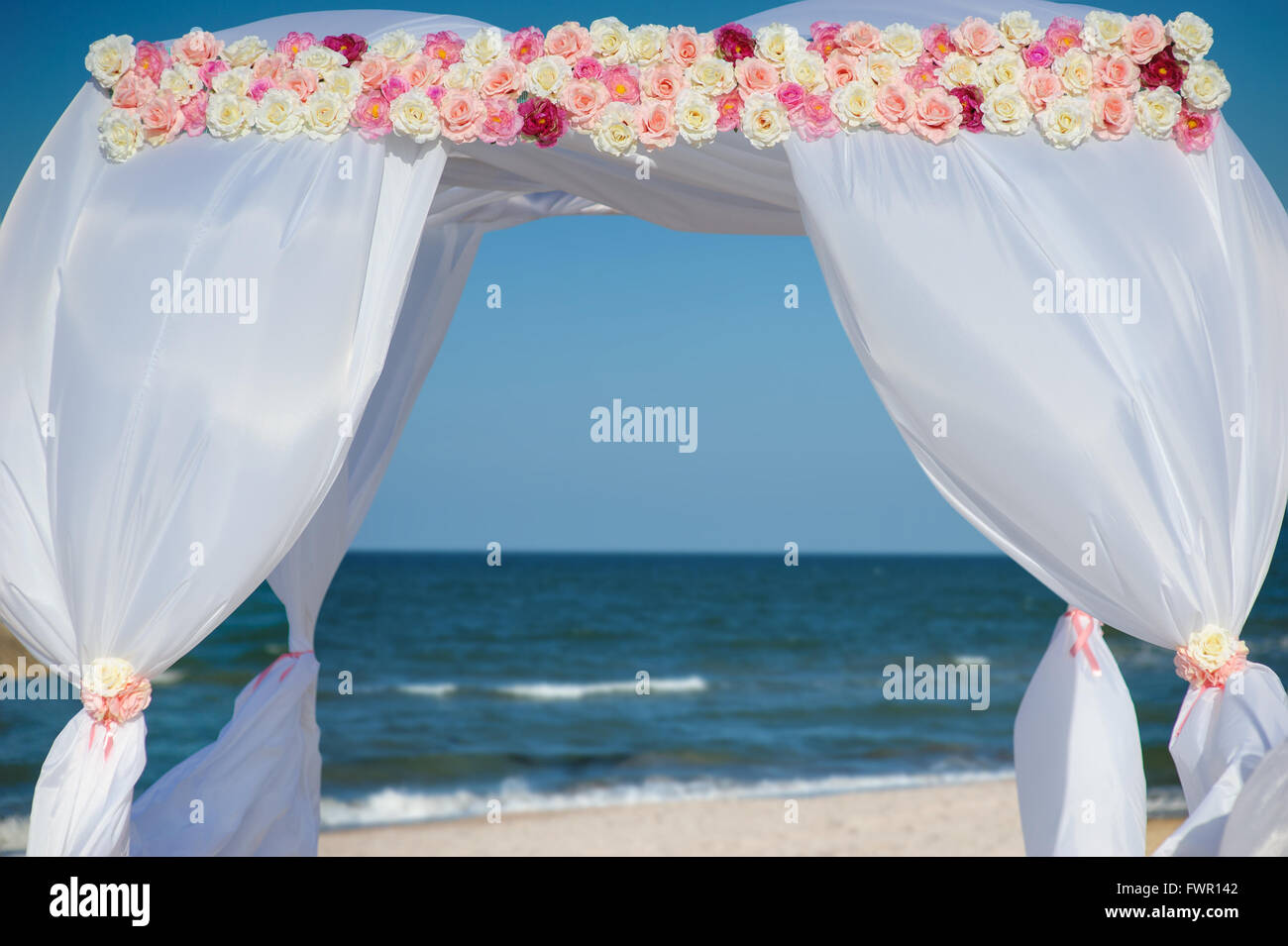 wedding arch for ceremony on background of sea Stock Photo - Alamy