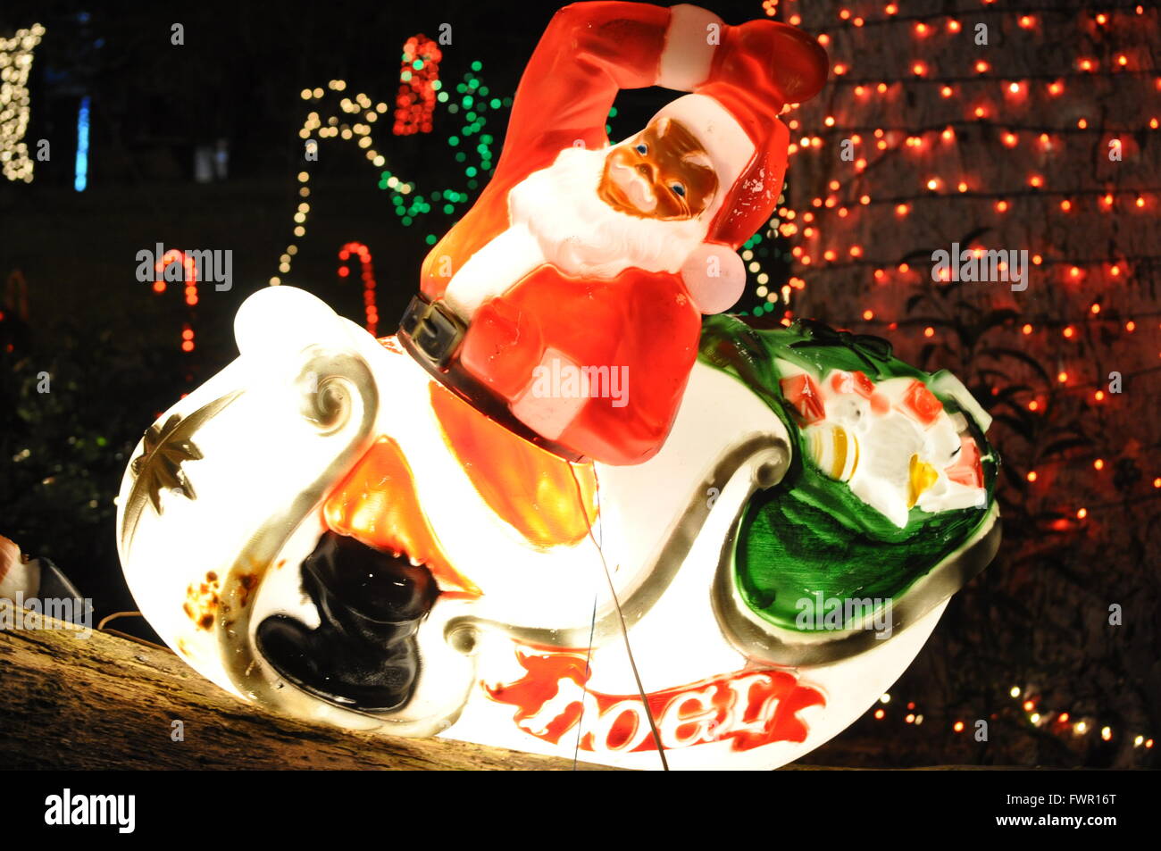 Santa on his sleigh Christmas lights Stock Photo - Alamy