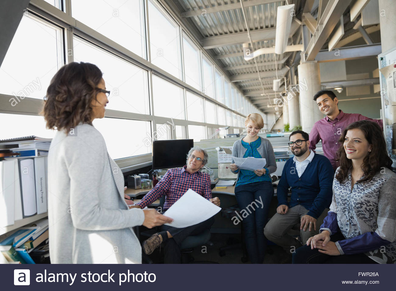 Business team gathered for a meeting Stock Photo - Alamy