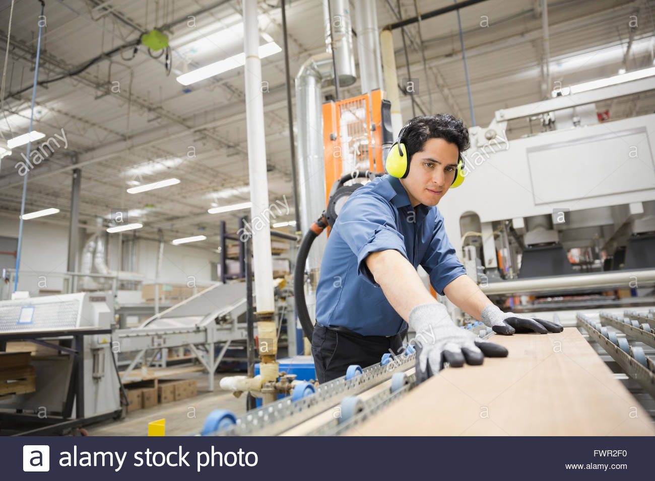 Standing industry working technology manufacturing concentration hi-res ...