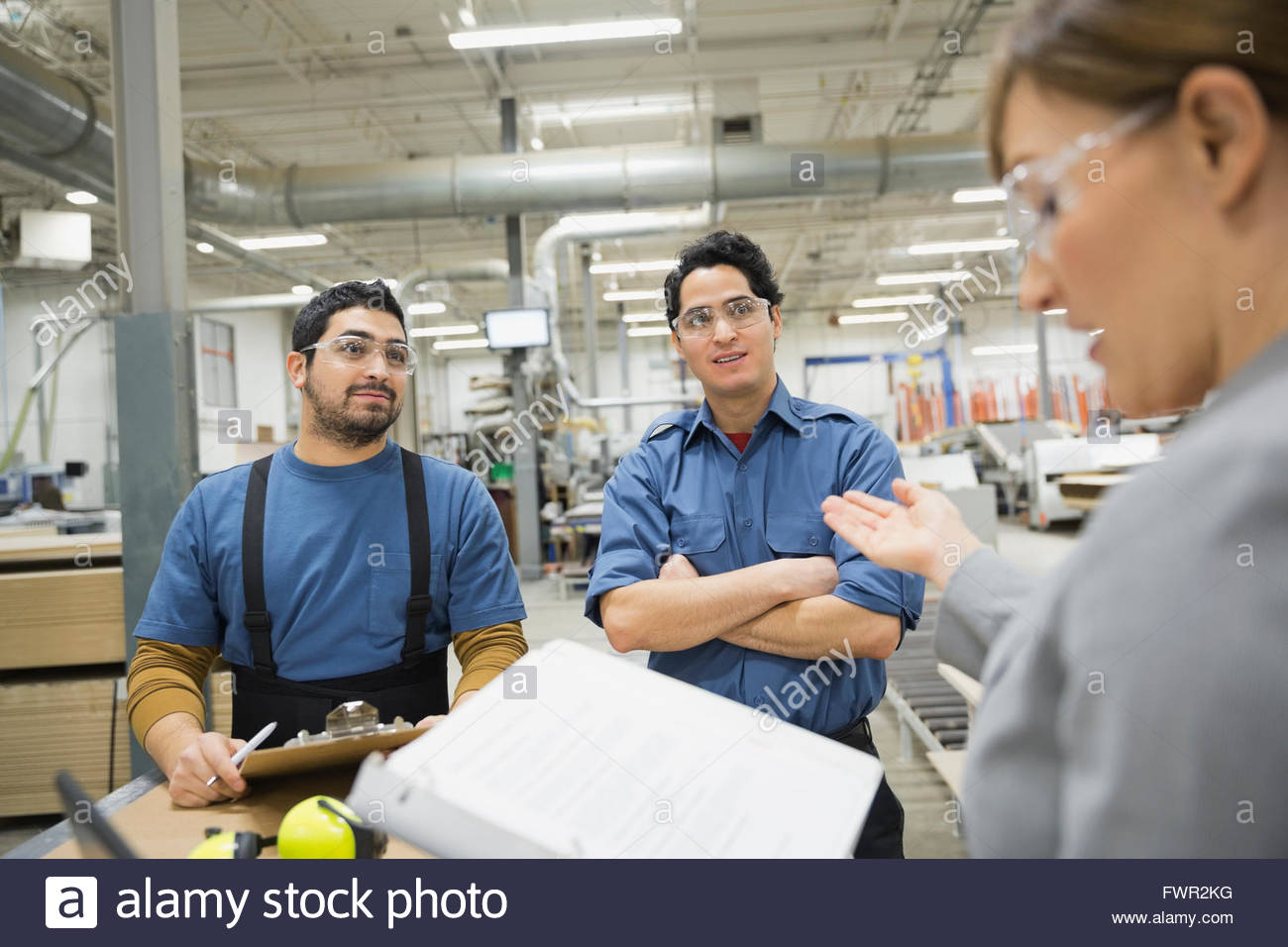 Skilled factory workers hi-res stock photography and images - Alamy
