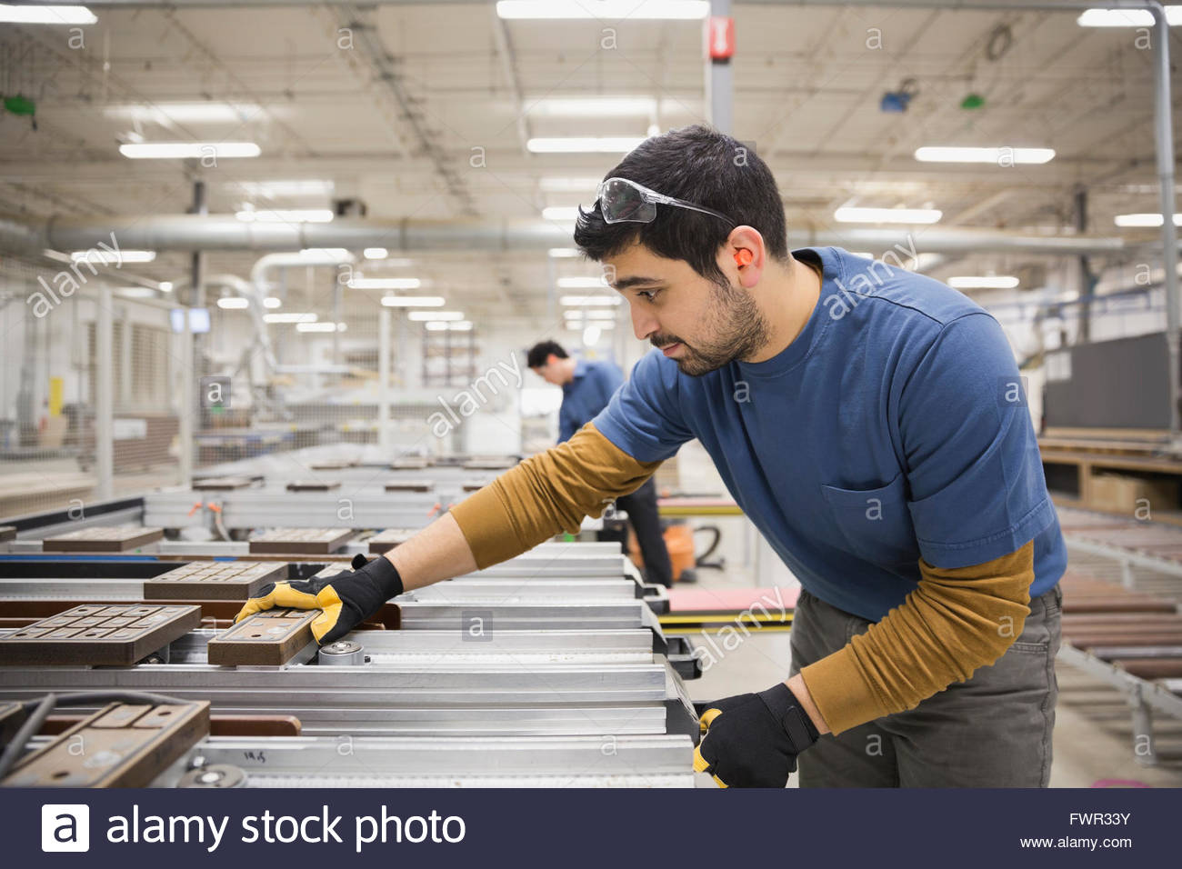 Male factory worker production line hi-res stock photography and images ...