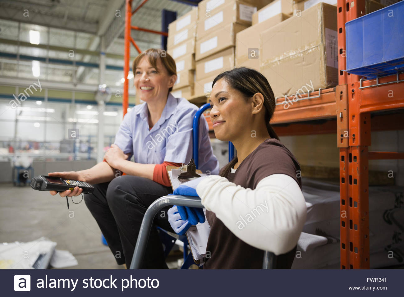 Female workers factory hi-res stock photography and images - Alamy