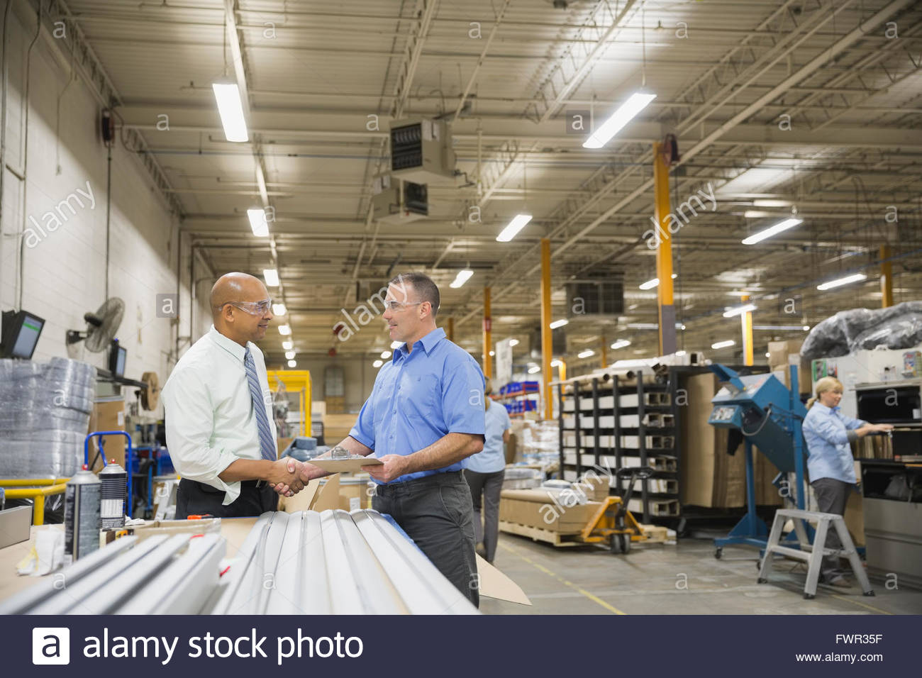 Manager meeting factory worker hi-res stock photography and images - Alamy