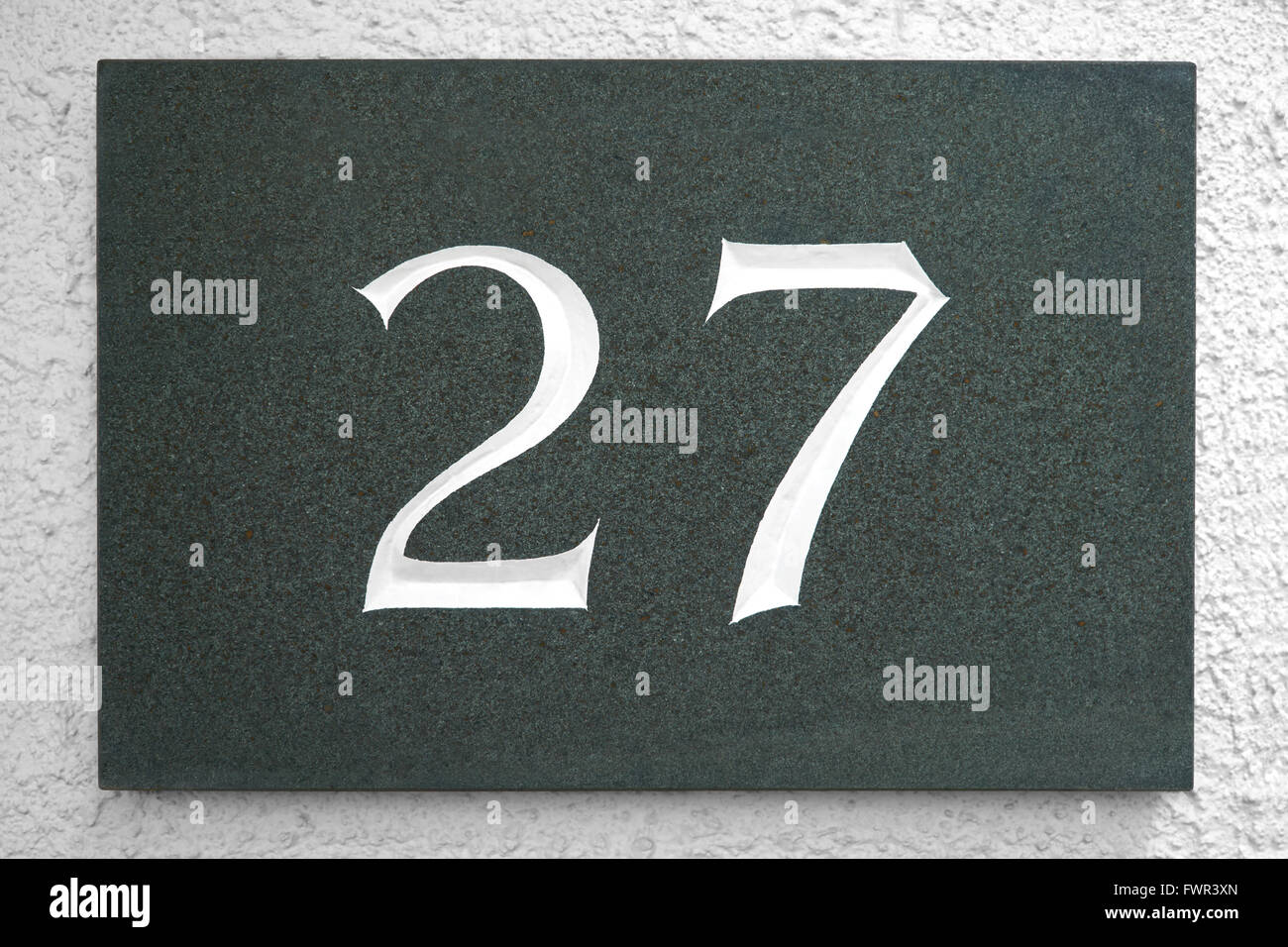 Number 27 carved into slate Stock Photo - Alamy