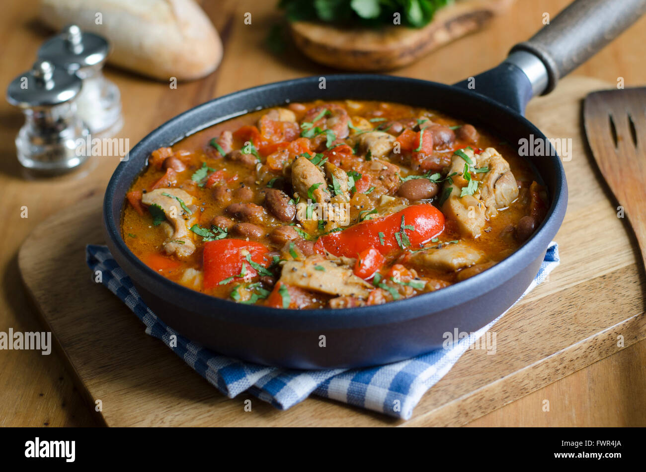 Chicken and bean stew Stock Photo - Alamy