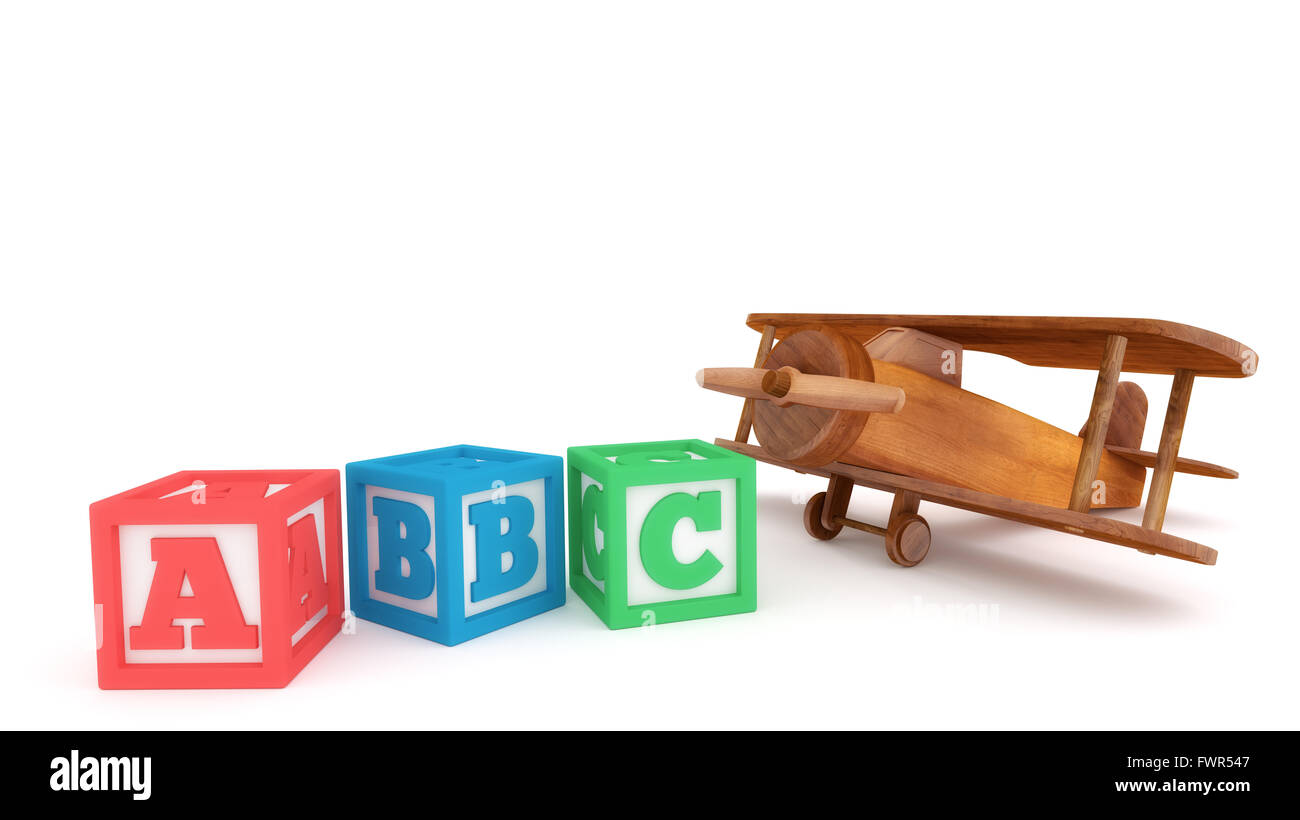 Wooden toy plane and learning blocks isolated on a white background ...