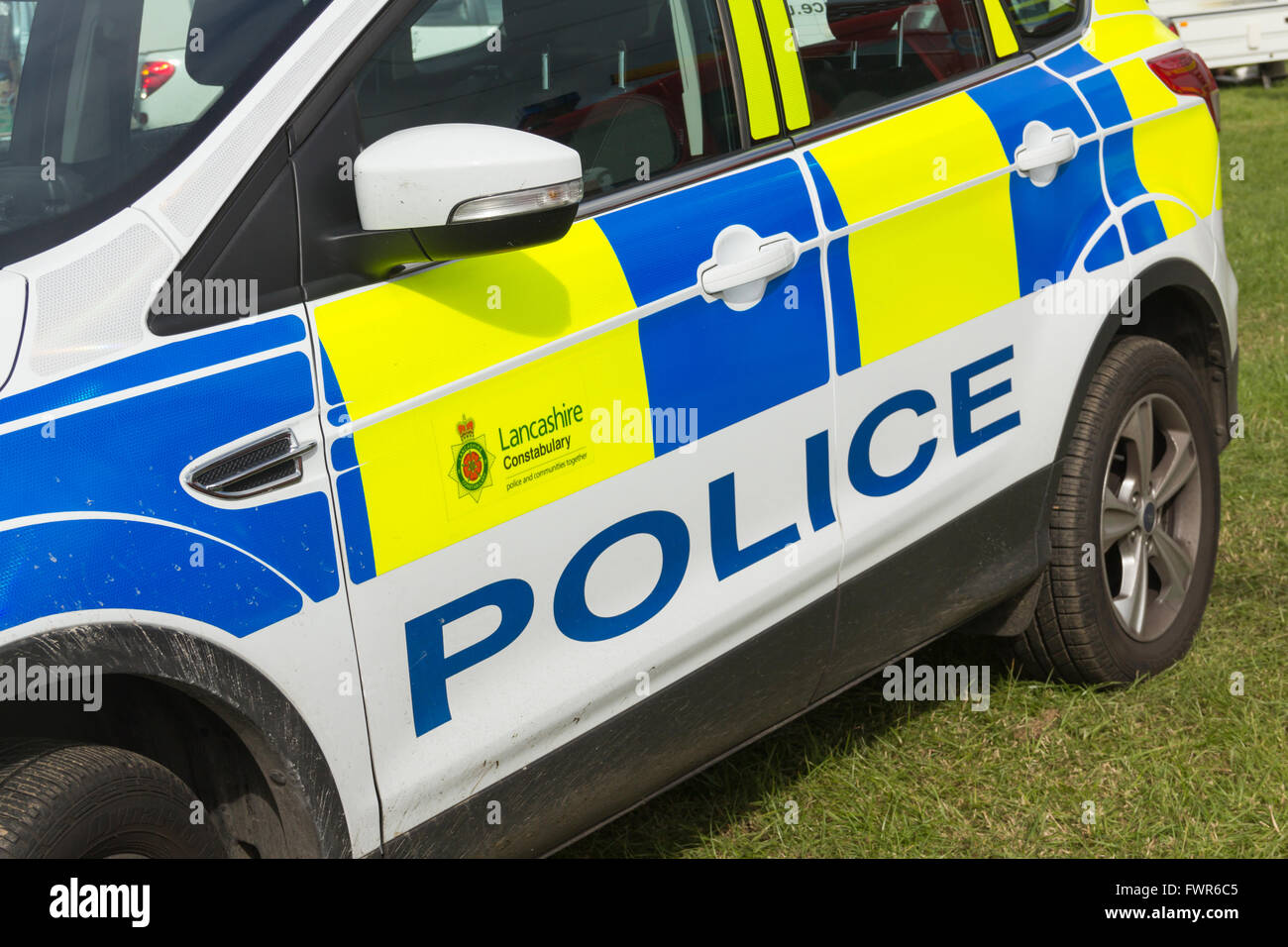 Police signage on the doors of a Lancashire Constabulary police car ...