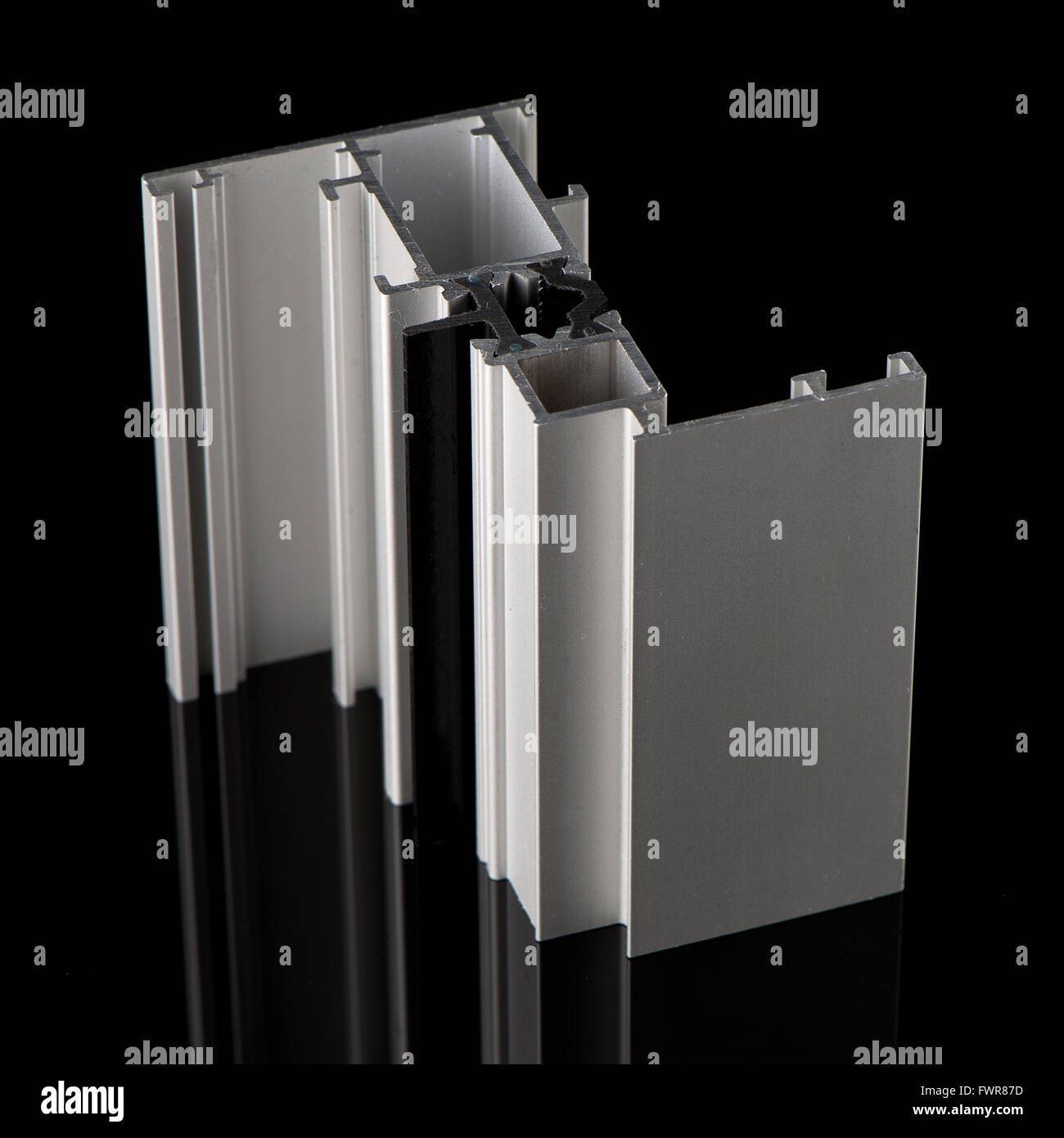 Aluminium profile sample isolated on black background Stock Photo - Alamy