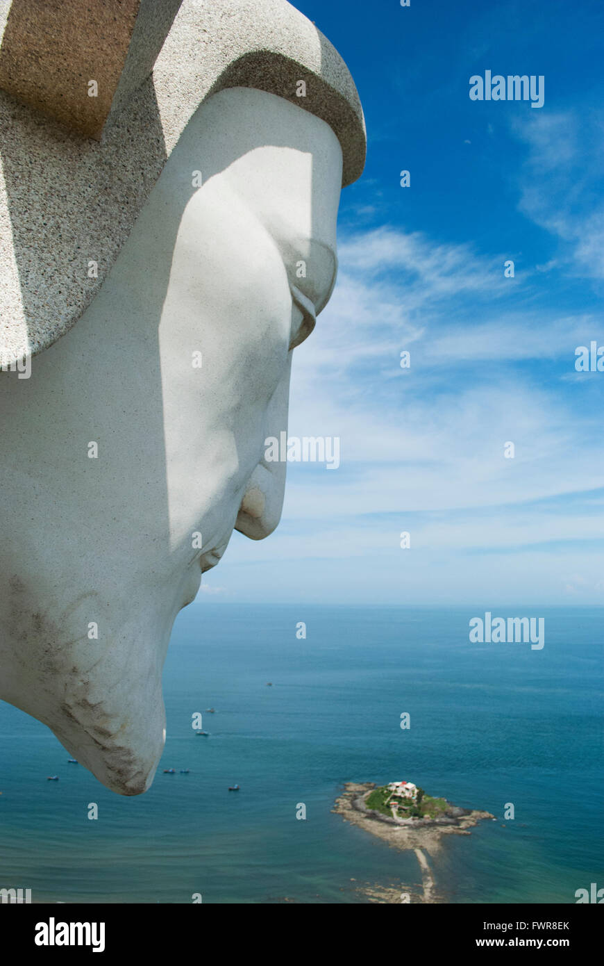 Statue of Jesus overlooking an island in Vung Tau Stock Photo - Alamy