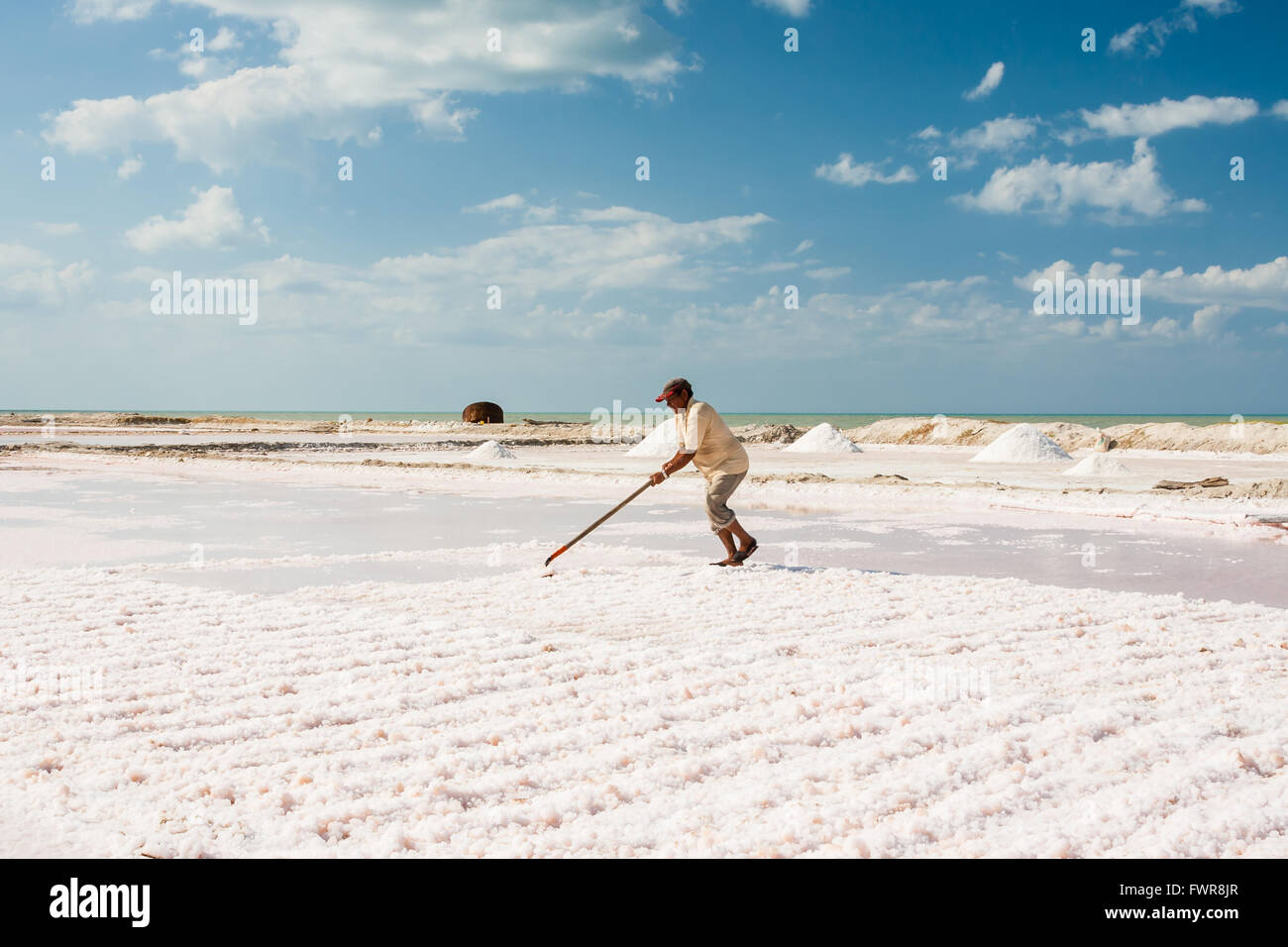 Wayuu man working at Manaure salt mine at La Guajira, Colombia Stock ...