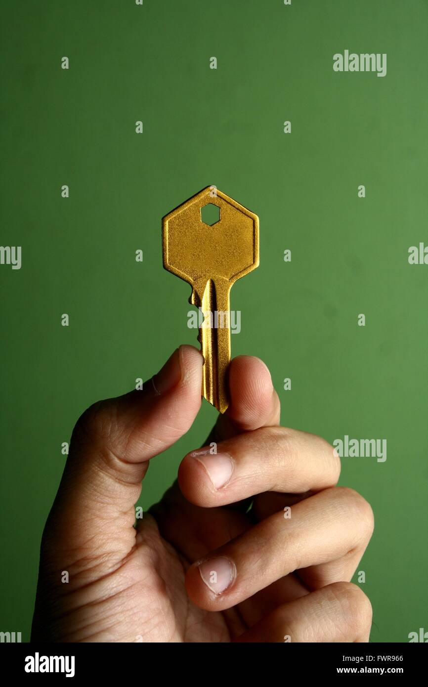 Held by thumb and forefinger hi-res stock photography and images - Alamy