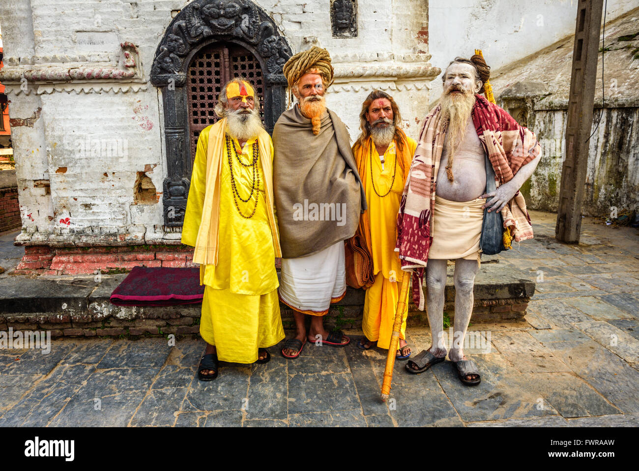 Wandering Shaiva sadhus (holy men) with traditional long hair and ...