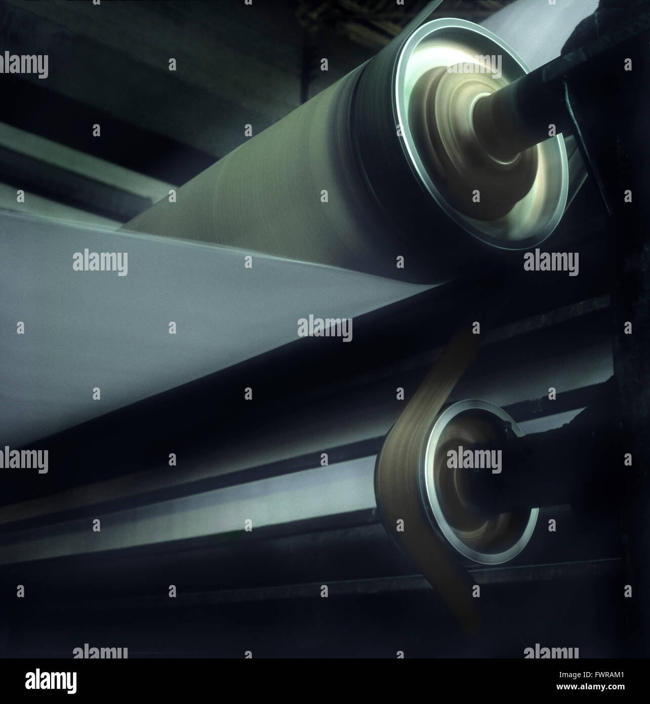 Medium format film photography shot. Paper reel rolling at a paper ...