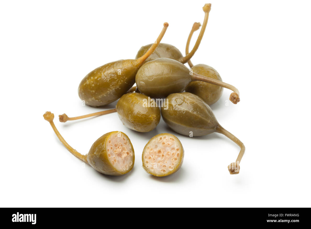 Heap of pickled caperberries on white background Stock Photo - Alamy