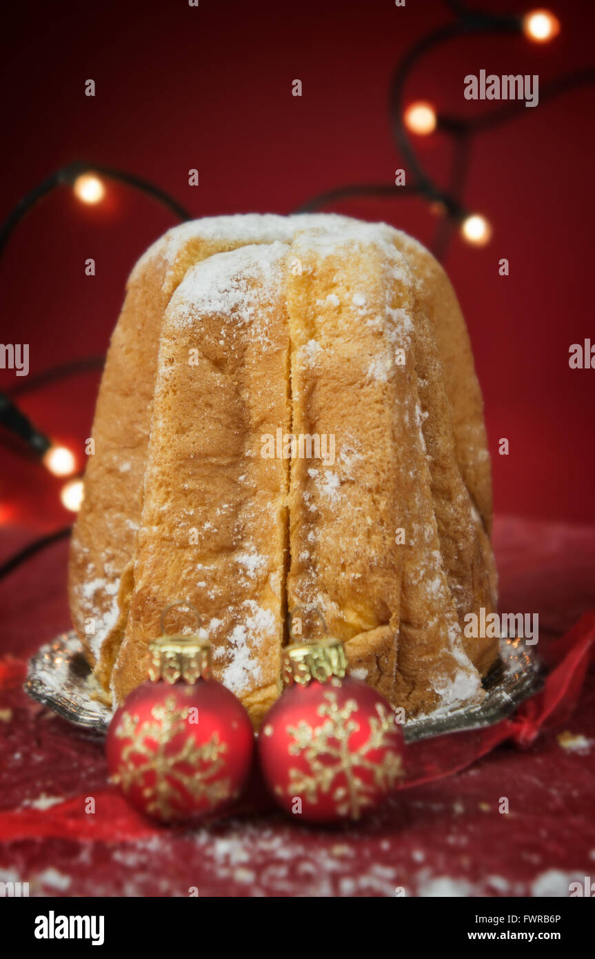 Pandoro - traditional italian Christmas cake on decorated table Stock ...